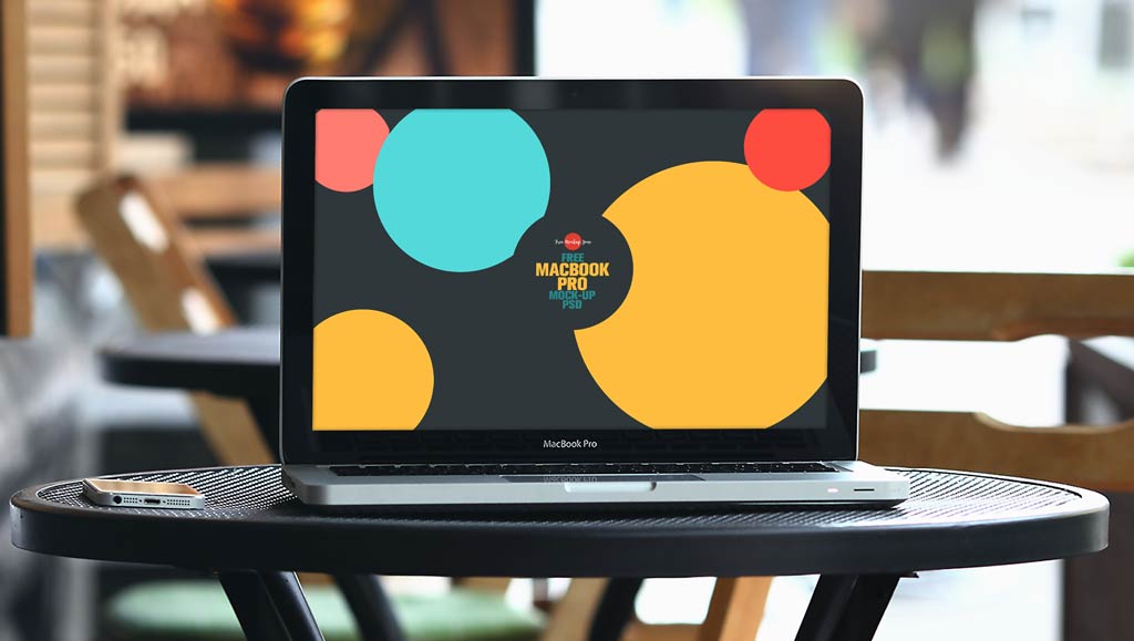 MacBook Pro on Restaurant Table Mockup - Mockup World