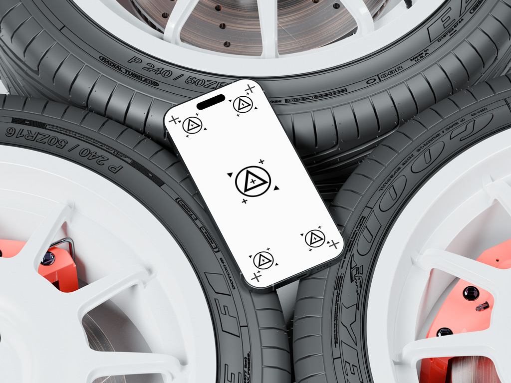 iPhone 16 Pro on Car Wheels Mockup - Mockup World