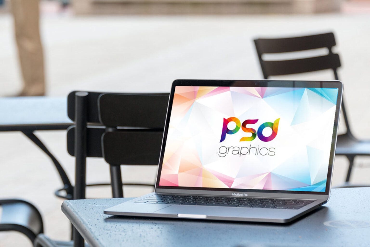 MacBook Pro in a Café Mockup - Mockup World