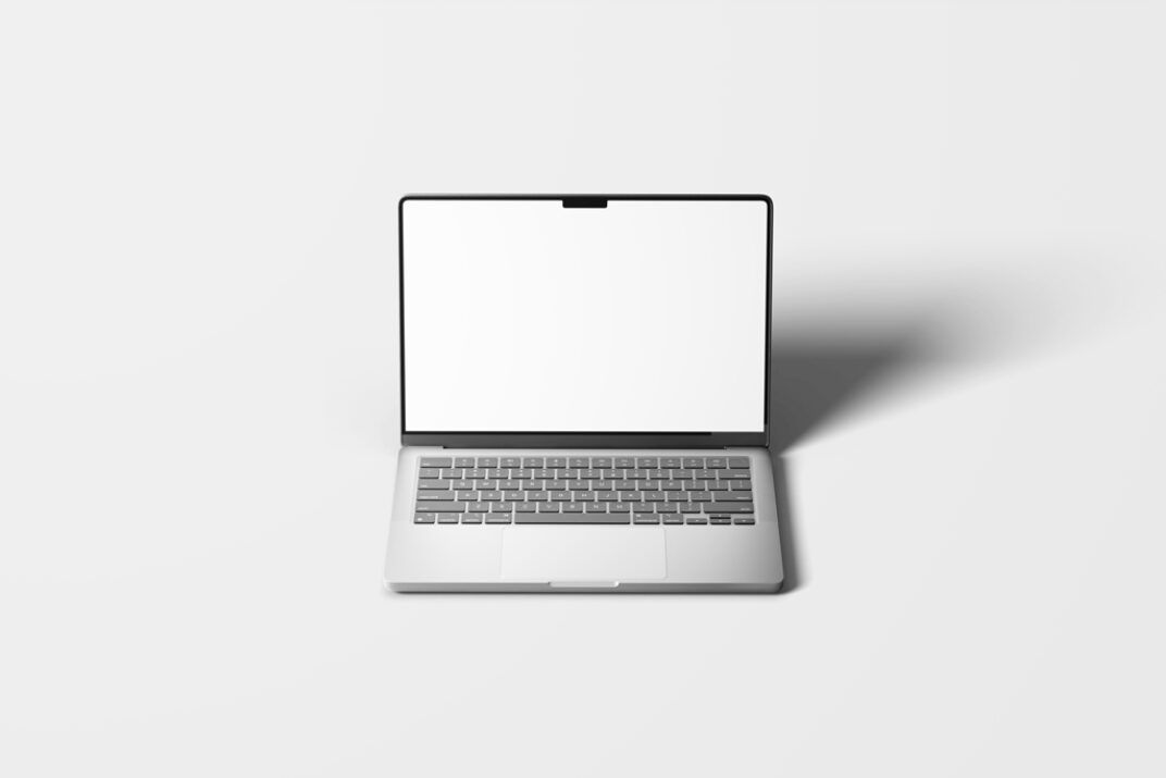 MacBook Pro with open Display Mockup - Mockup World