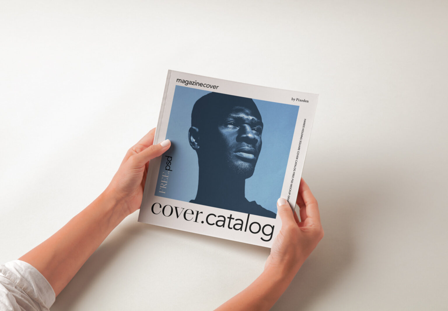 Hands holding square Magazine Mockup - Mockup World