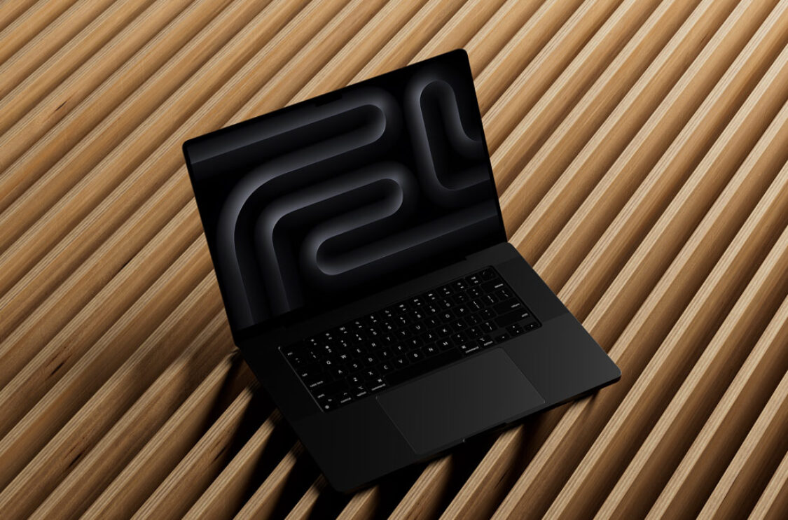 MacBook in Street Café Mockup - Mockup World