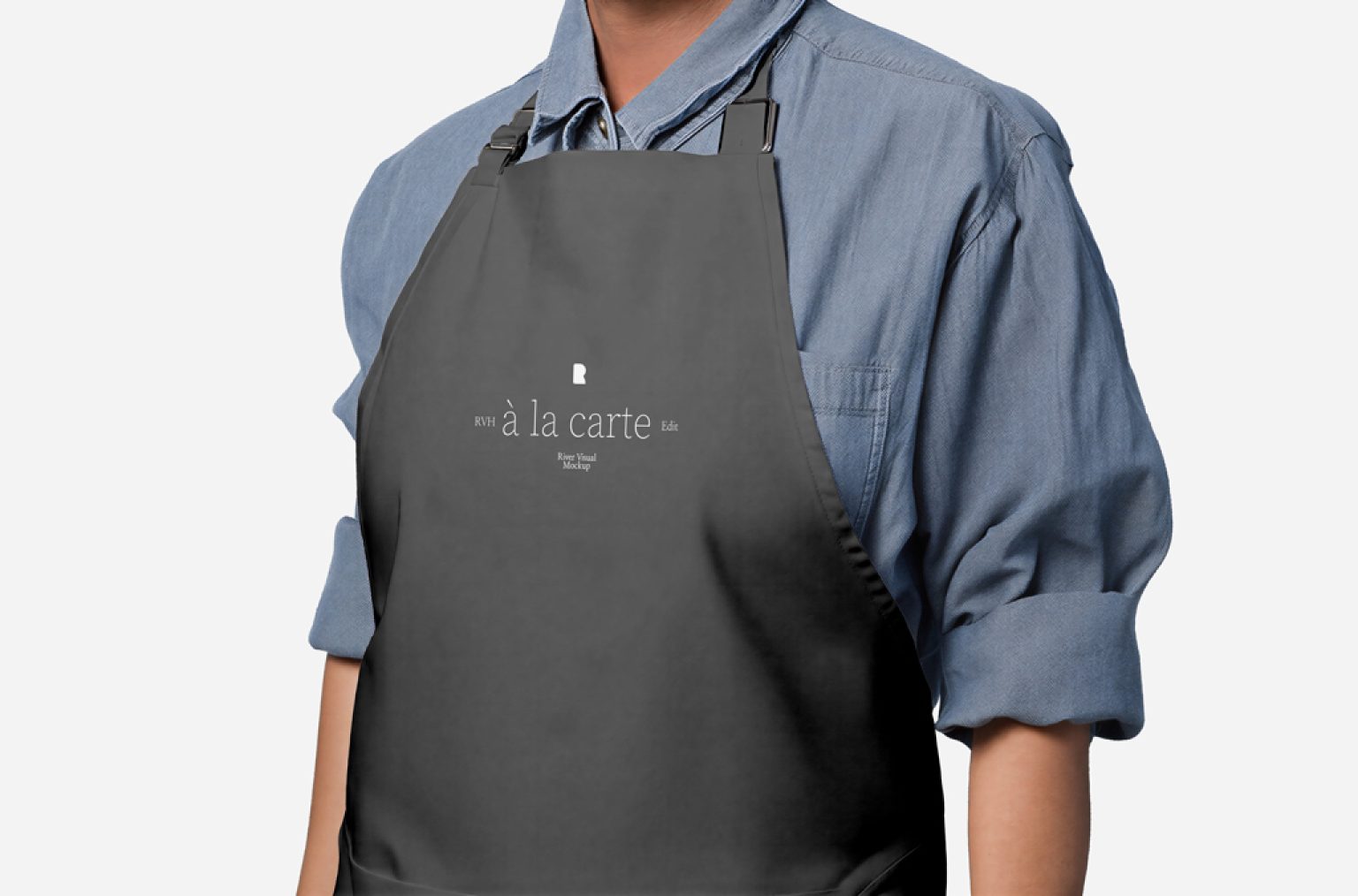 Apron on Man in Denim Shirt Mockup - Mockup World